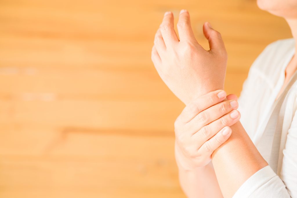 How to Reduce Wrist Pain | Causes, Exercises & Home Remedies